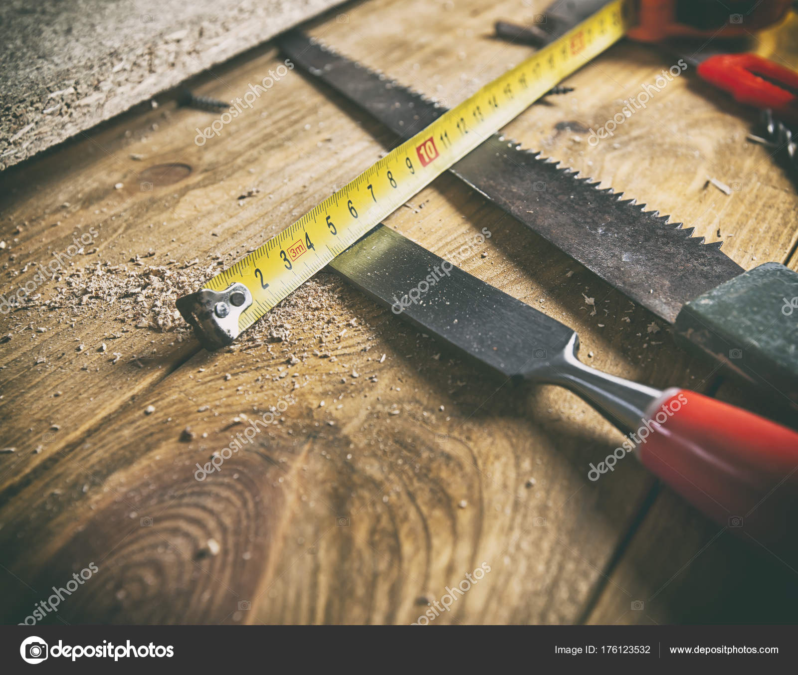 Set of different building equipments on the wooden table Stock Photo by ...