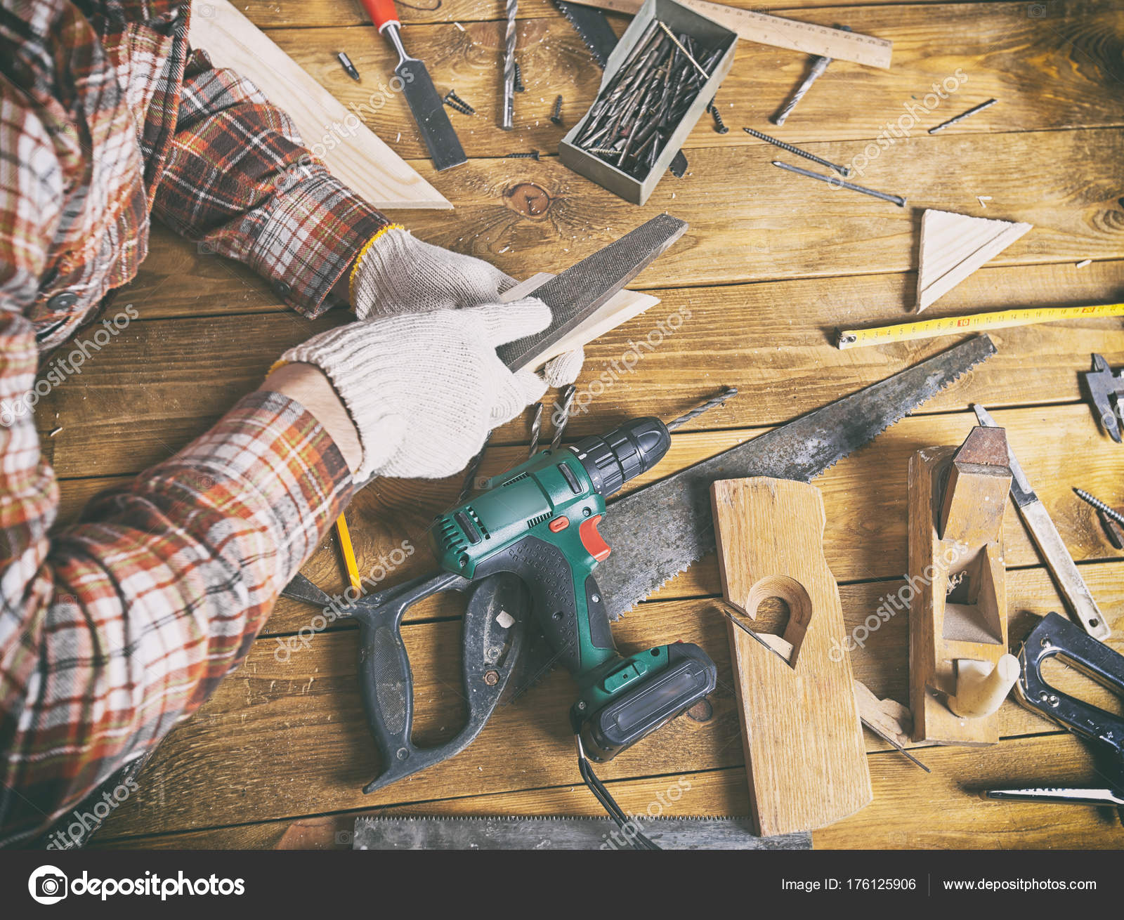 The carpenter works with wood on his workspace — Stock Photo ...
