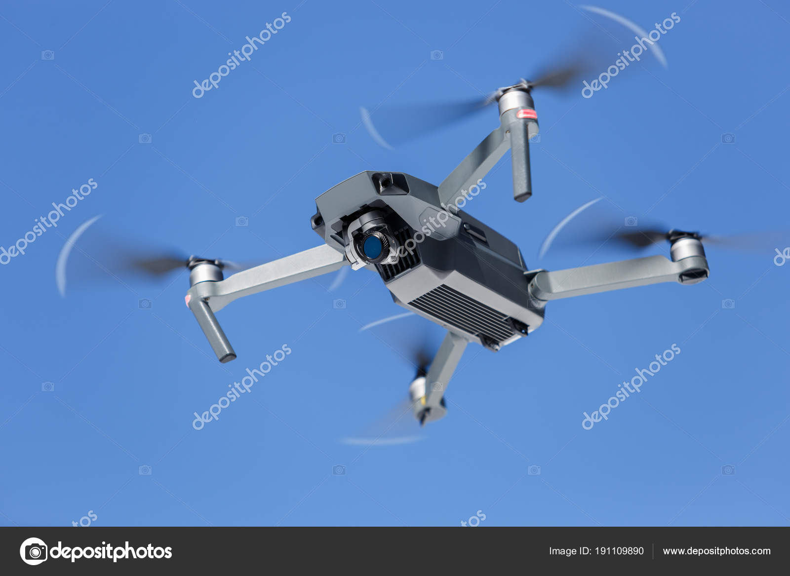 Flying drone camera shoot aerial photo & video Stock Photo by ...