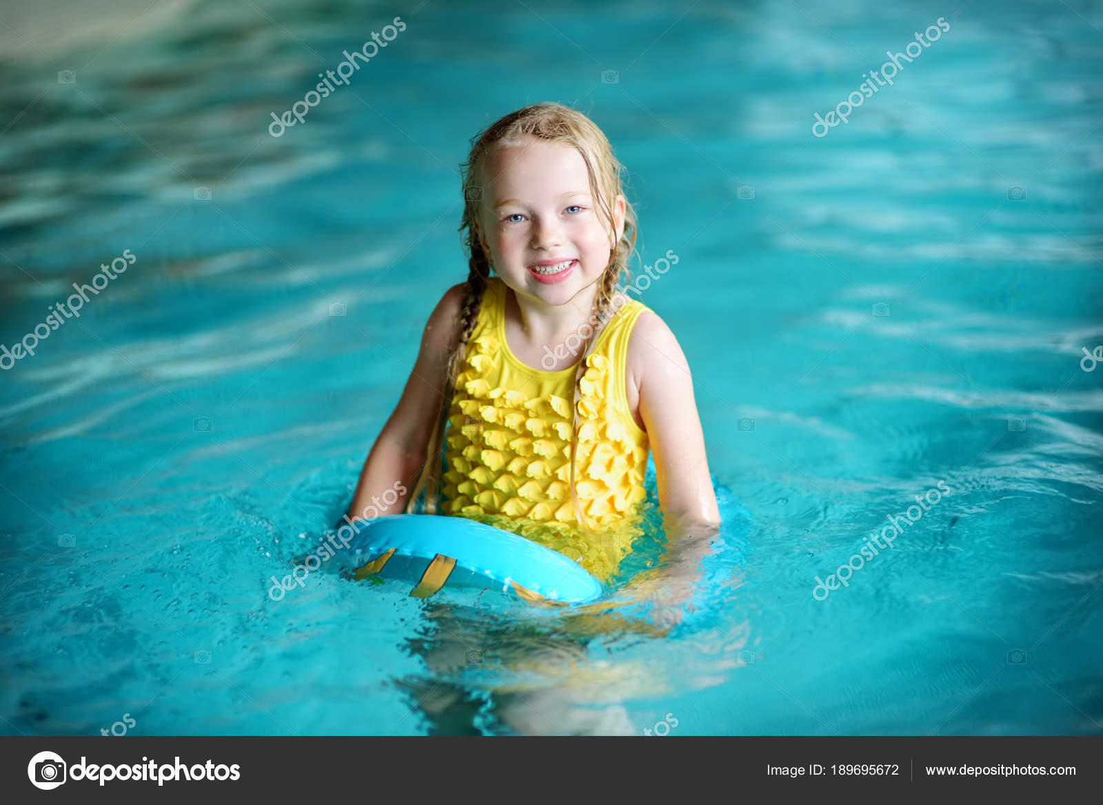Cute Little Girl Playing Inflatable Ring Indoor Pool Child Learning ...