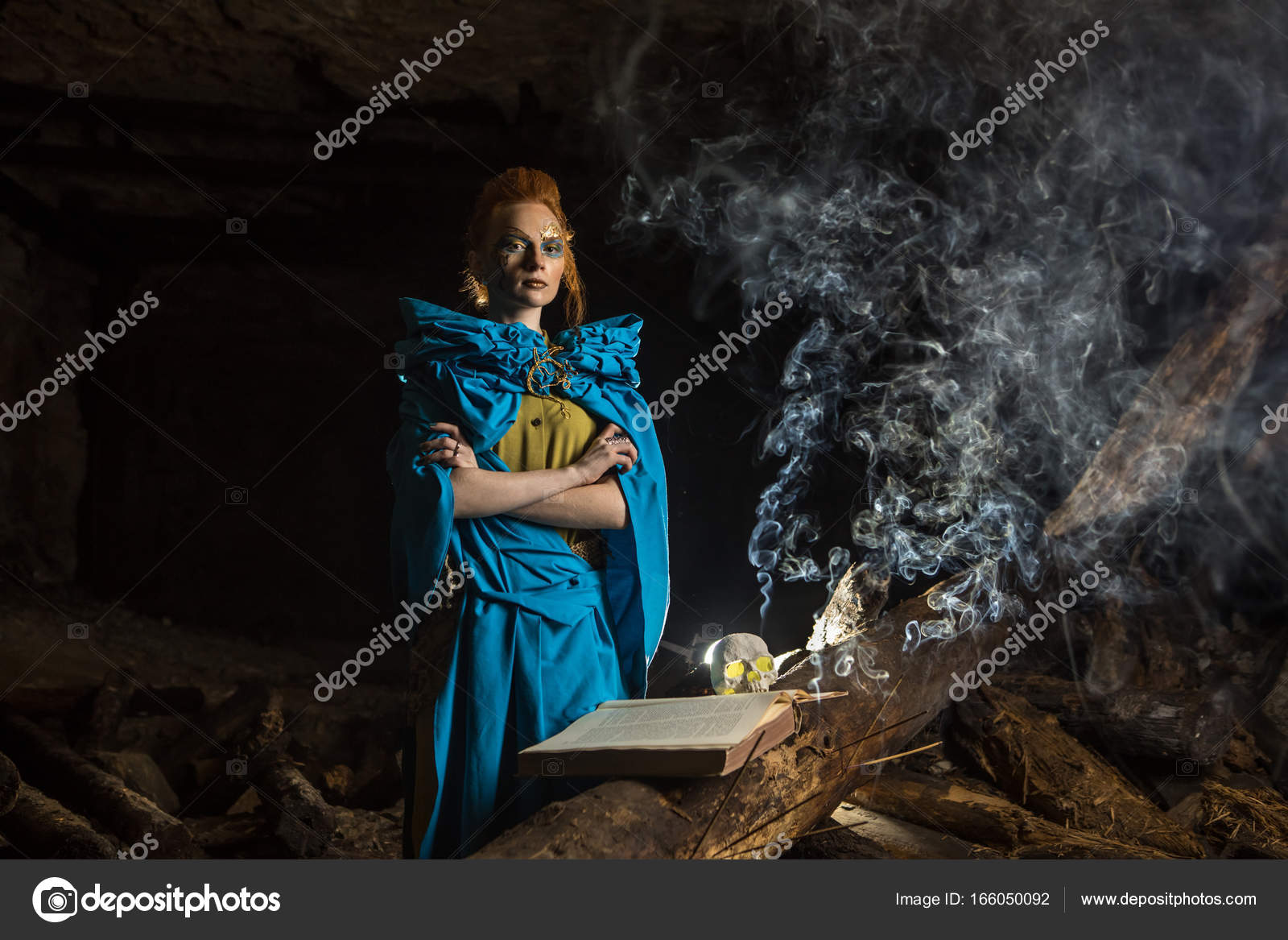 Beautiful red haired witch with the spellbook. Stock Photo by ©bigdan ...