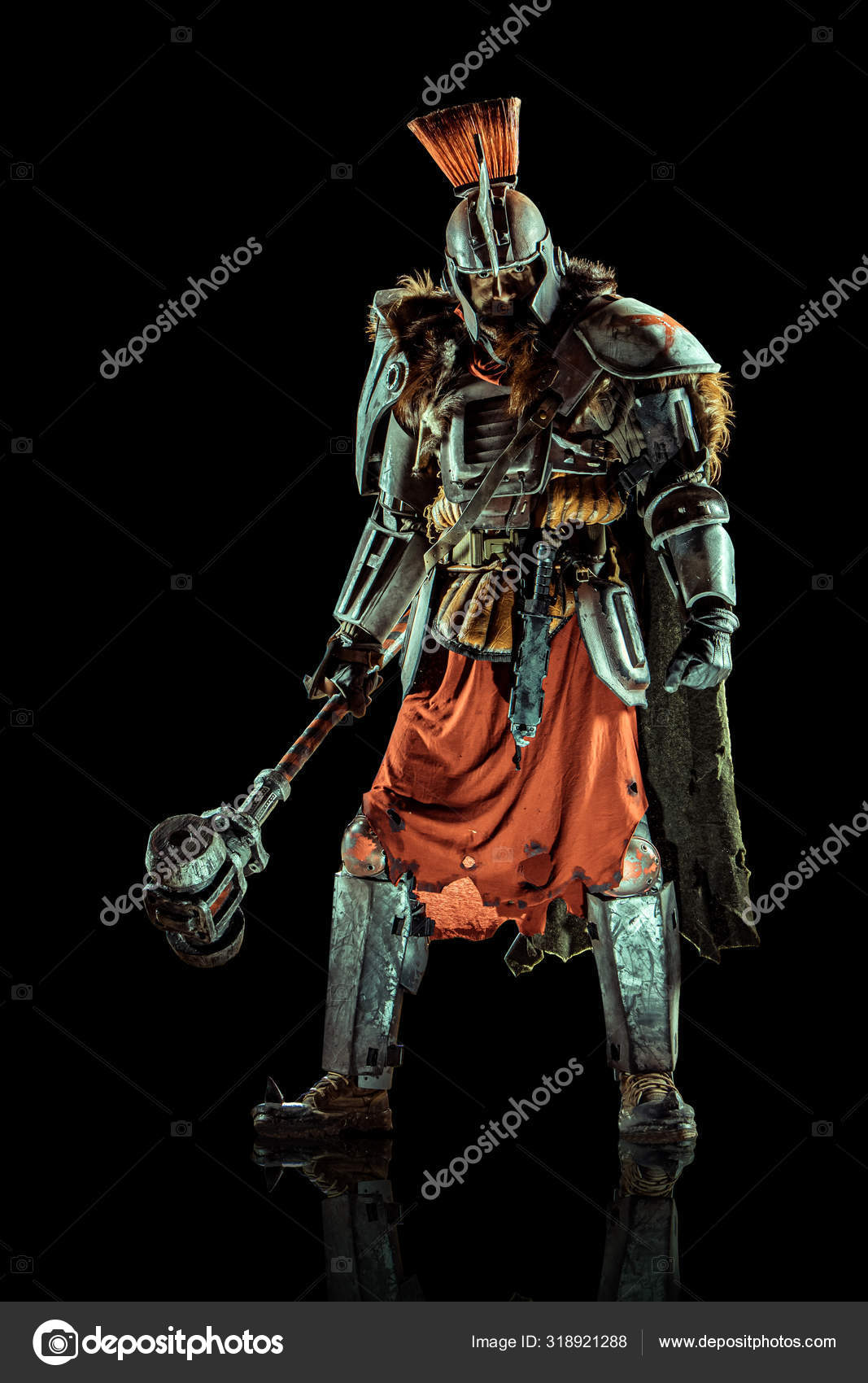 Powerful knight in the armor with the hammer. Isolated on black ...