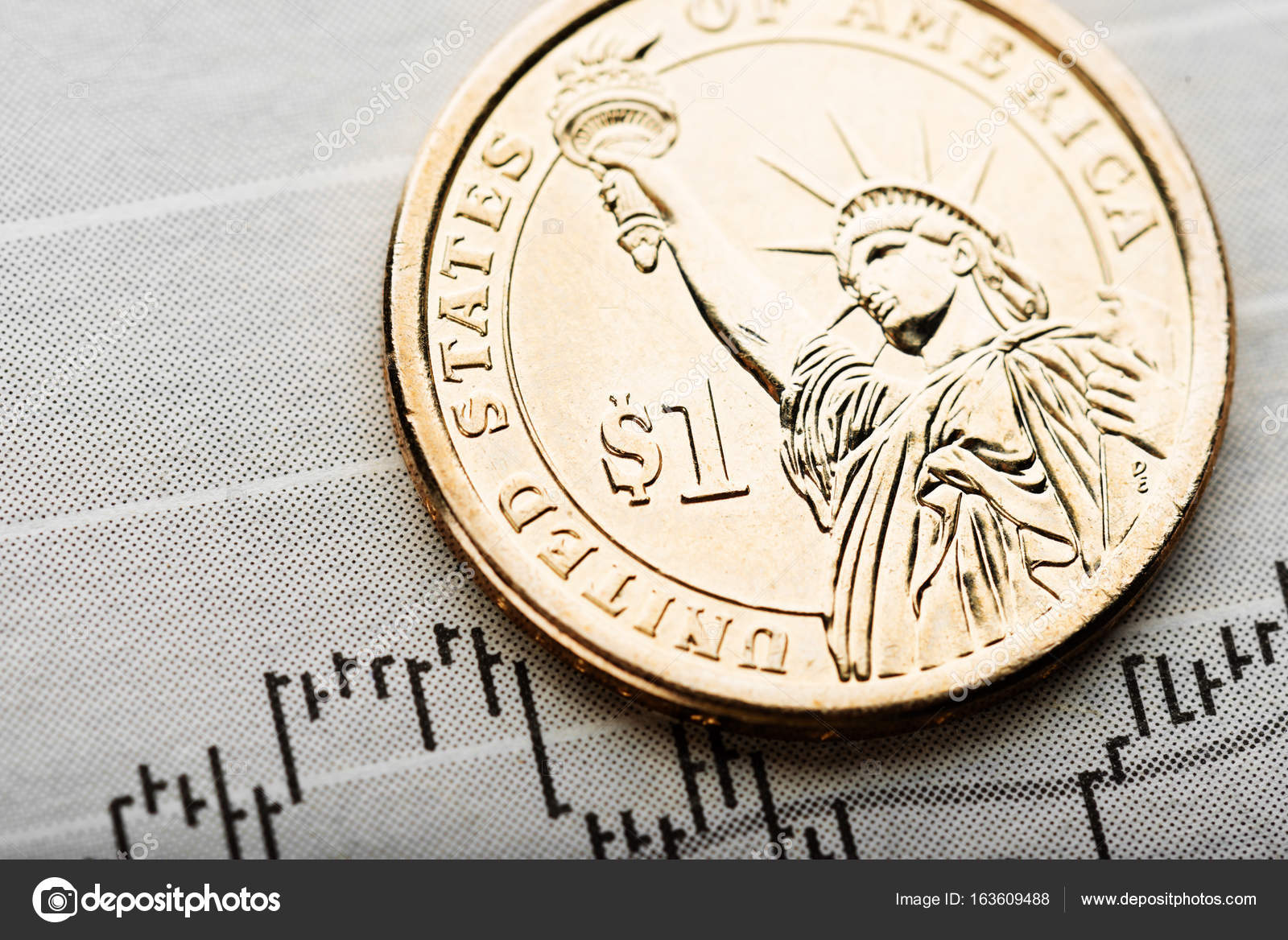 Dollar coin on fluctuating graph Stock Photo by ©valphoto 163609488