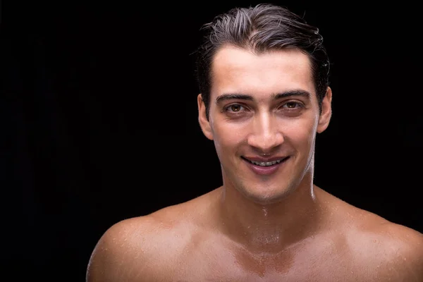 Ripped muscular handsome man on black background Stock Photo by ©Elnur ...