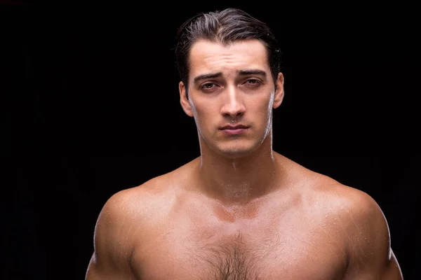 Ripped muscular handsome man on black background Stock Photo by ©Elnur ...