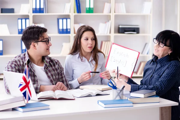 Young foreign student during english language lesson - Stock Image ...