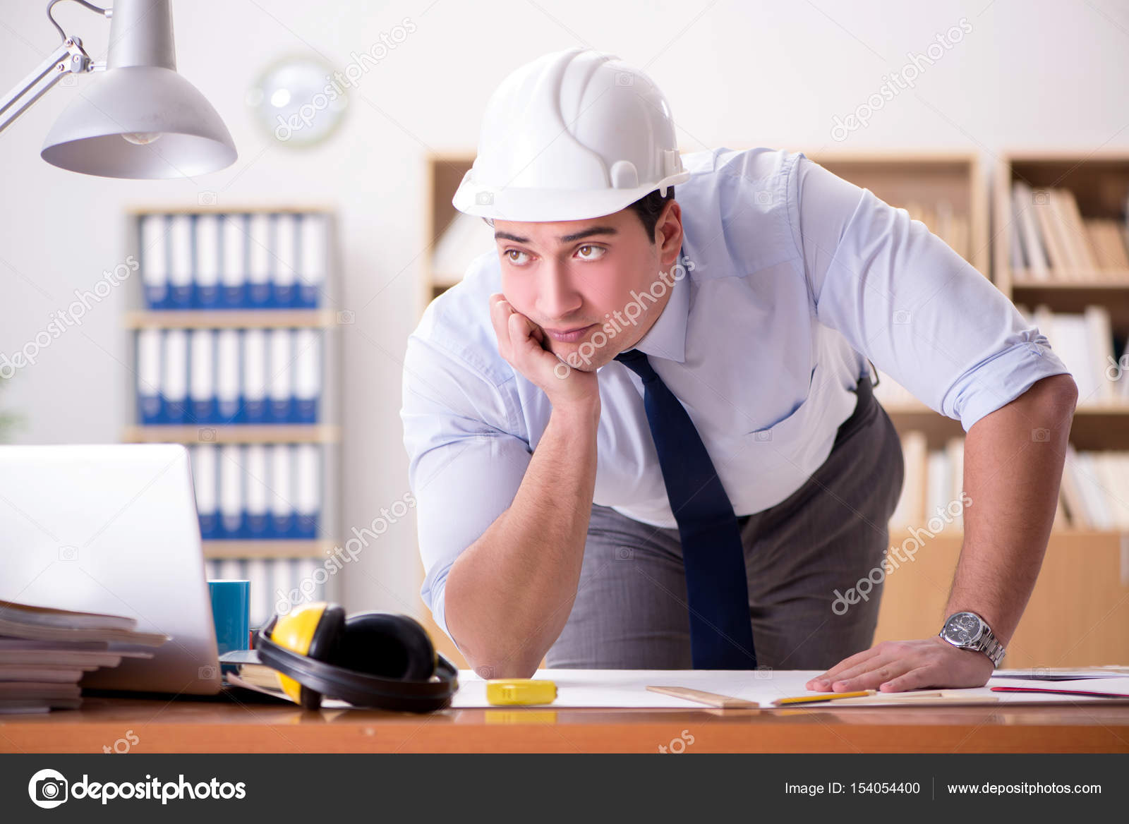 Engineer supervisor working on drawings in the office — Stock Photo ...