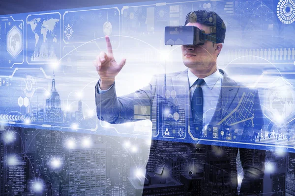 Businessman in virtual reality trading on stock market - Stock Image ...