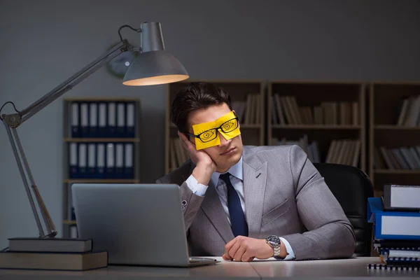 Businessman staying late to sort out priorities - Stock Image - Everypixel