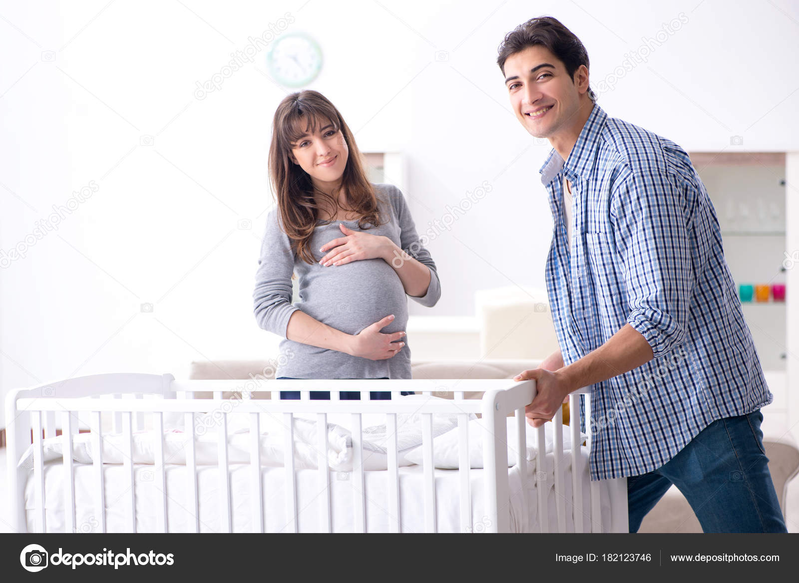 Young parents expecting their first baby — Stock Photo © Elnur_ #182123746