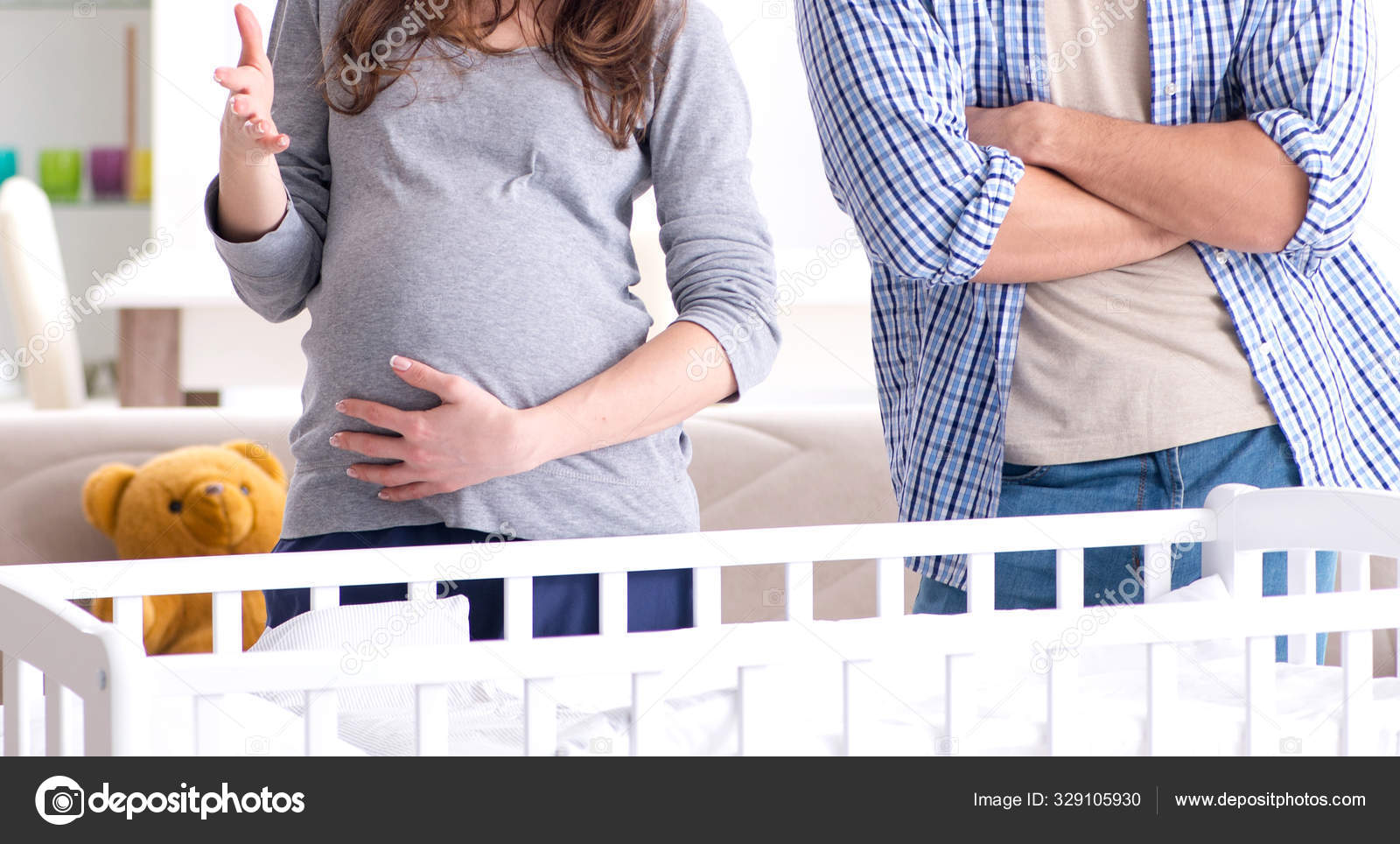 Young parents expecting their first baby — Stock Photo © Elnur_ #329105930