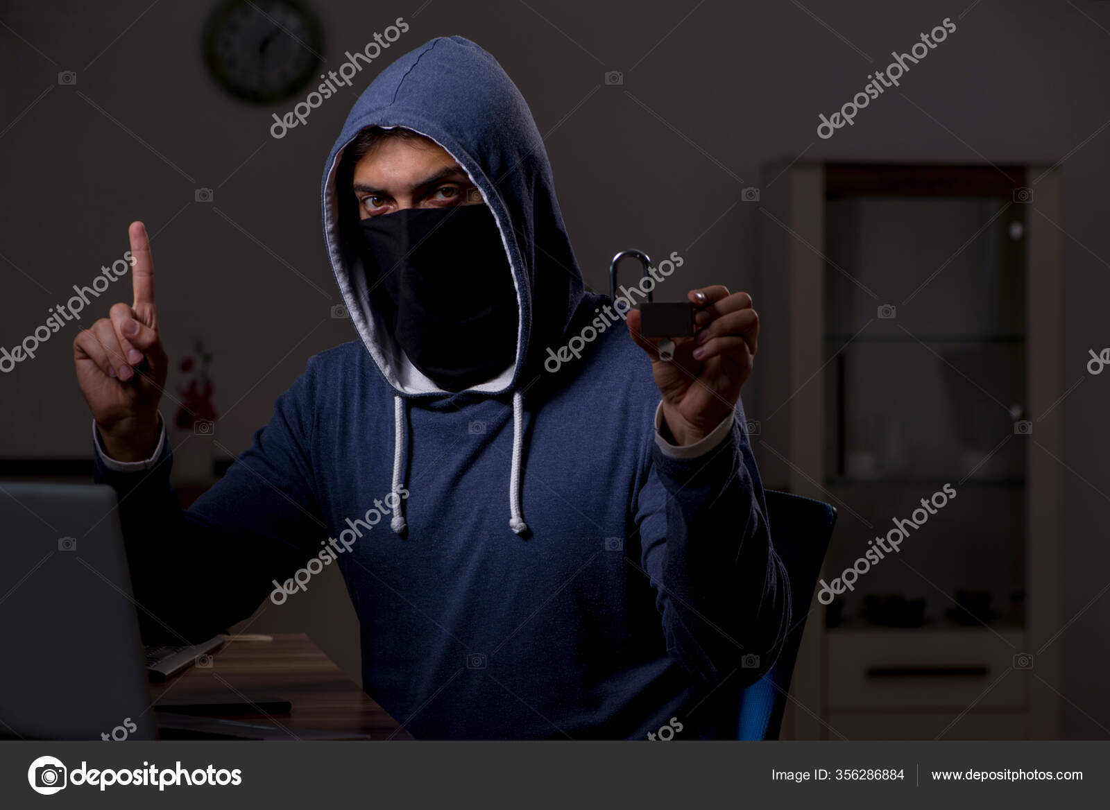 Male hacker hacking security firewall late in office — Stock Photo ...