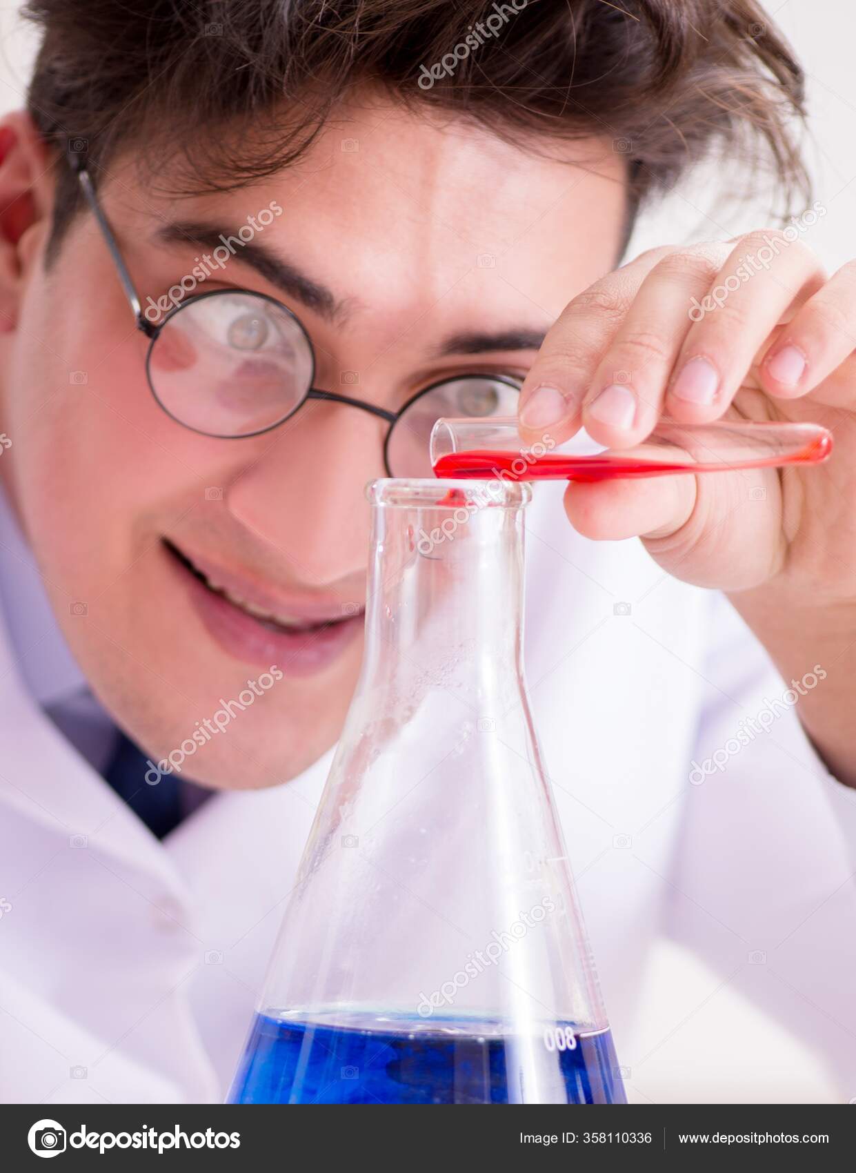 Mad crazy scientist doctor doing experiments in a laboratory — Stock ...