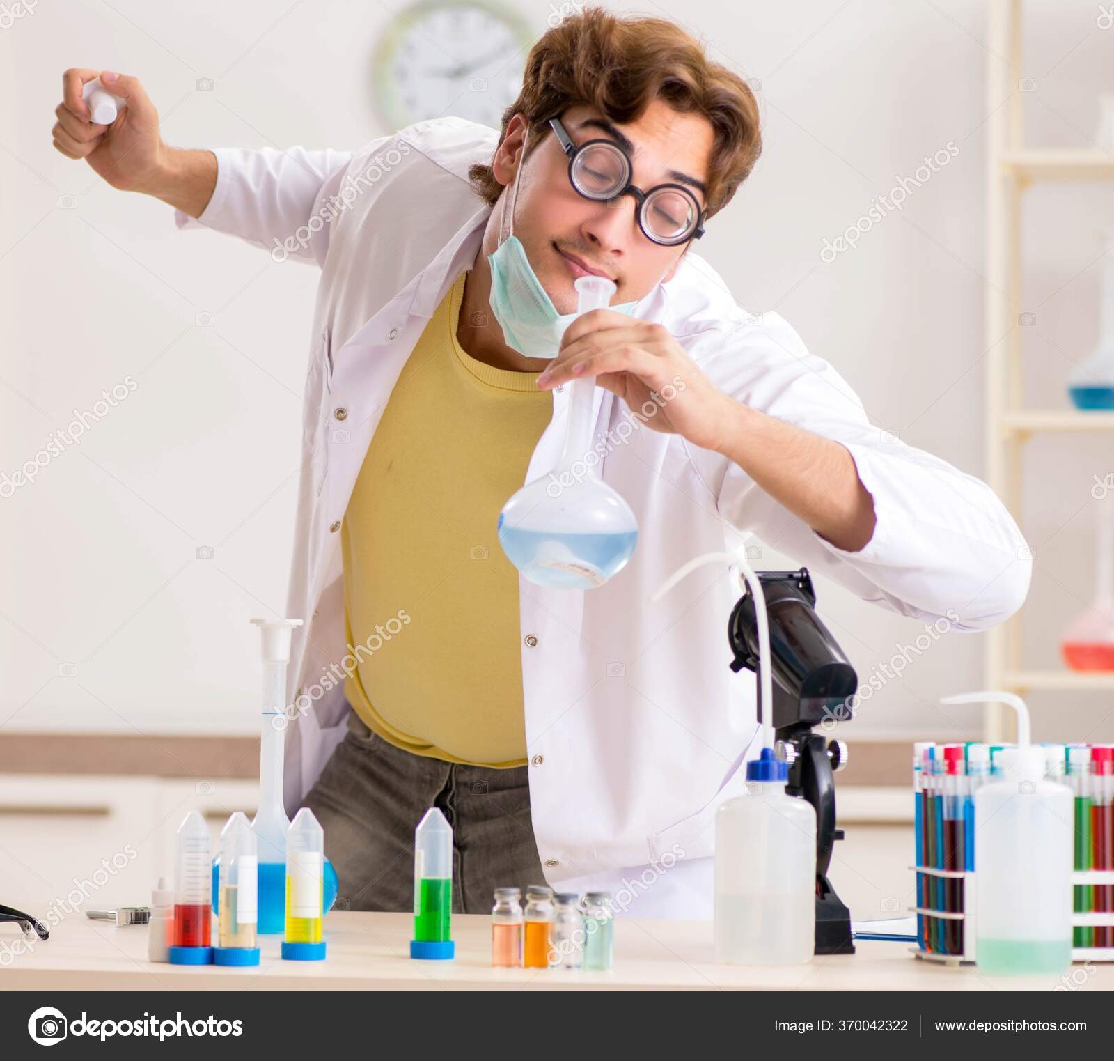 Funny crazy chemist doing experiments and tests Stock Photo by ©Elnur ...
