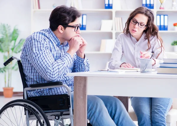 Disabled student studying and preparing for college exams Stock Photo ...