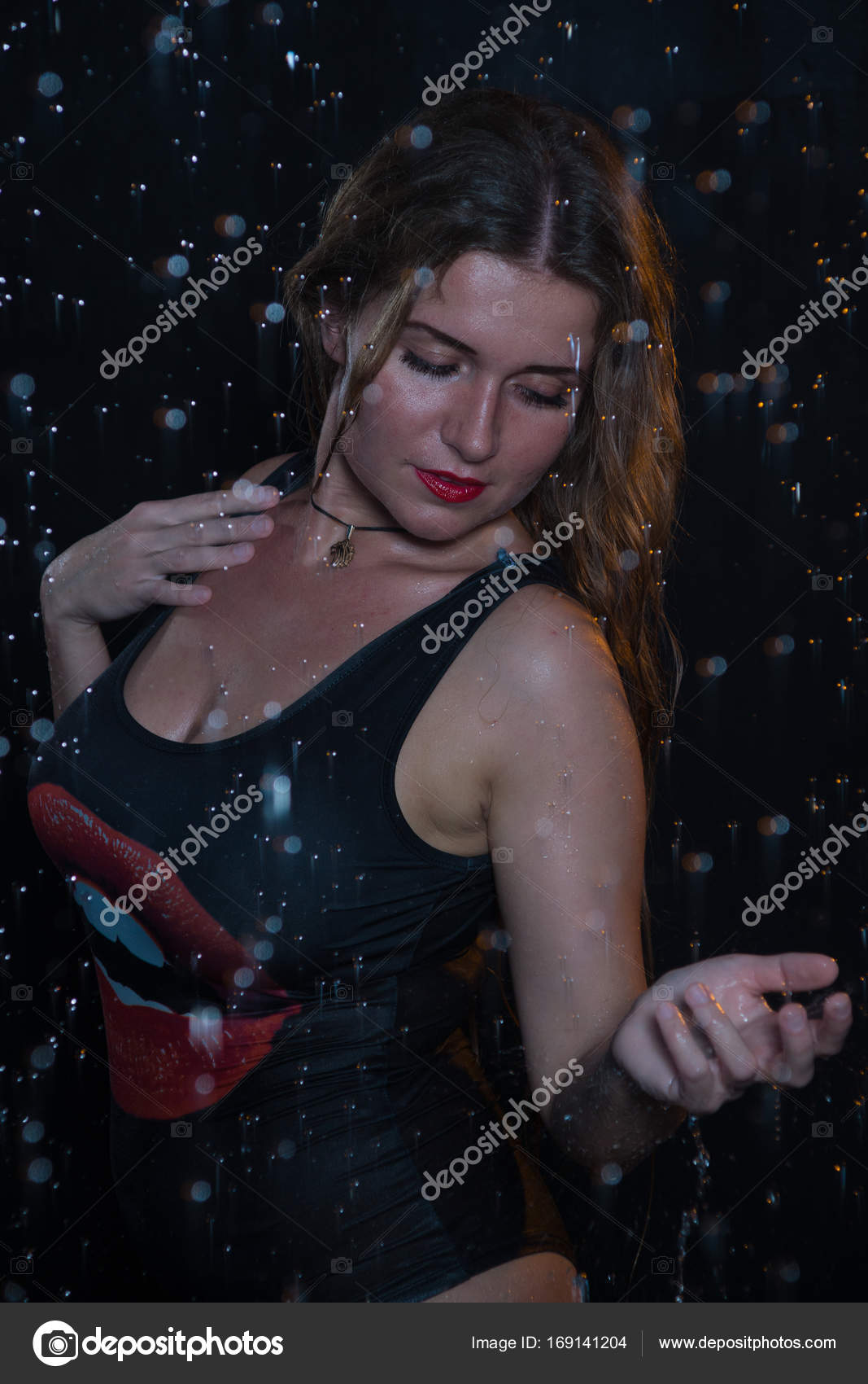Sexy beautiful woman under rain — Stock Photo © Demian #169141204