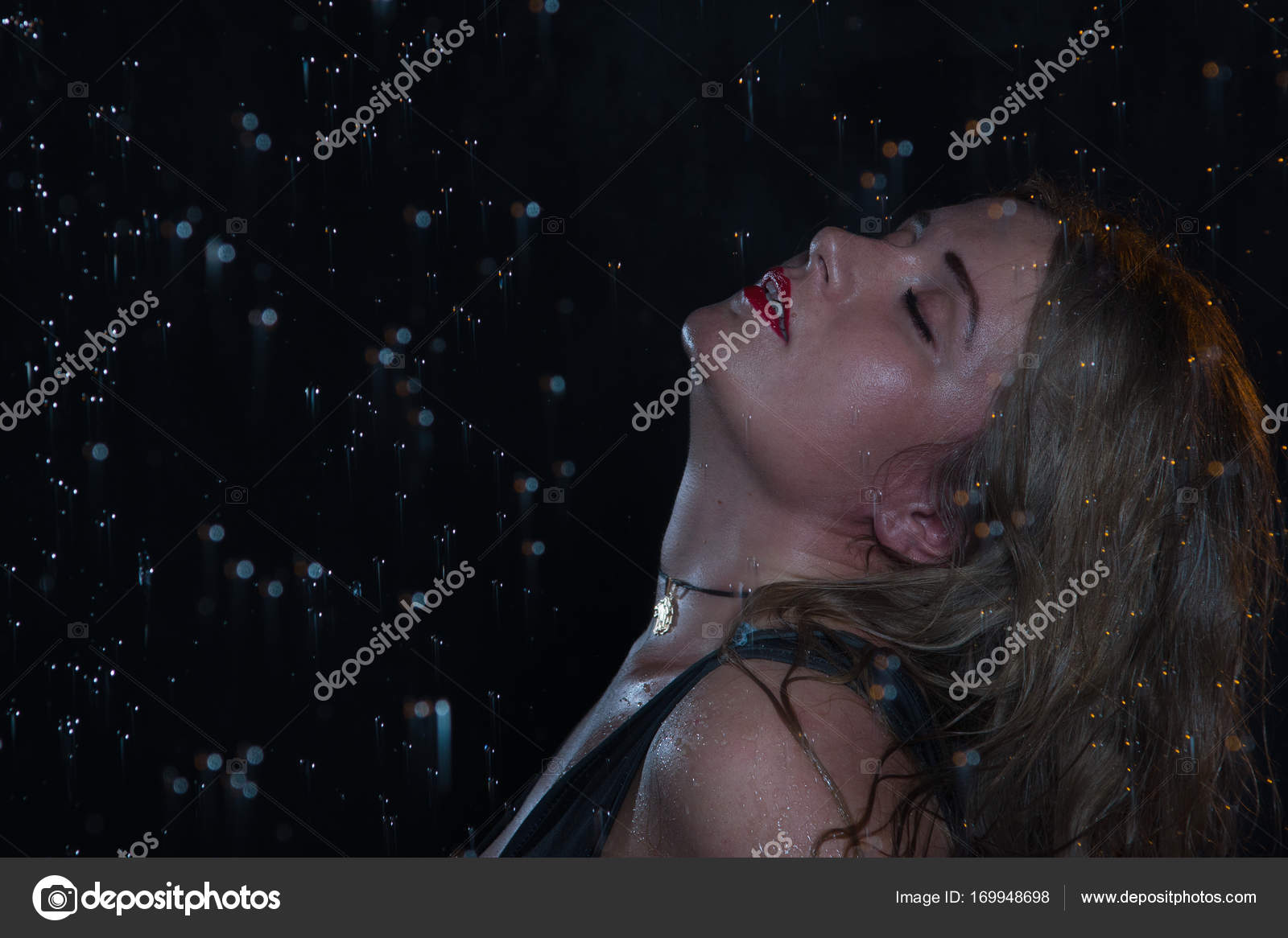 Sexy beautiful woman under rain — Stock Photo © Demian #169948698