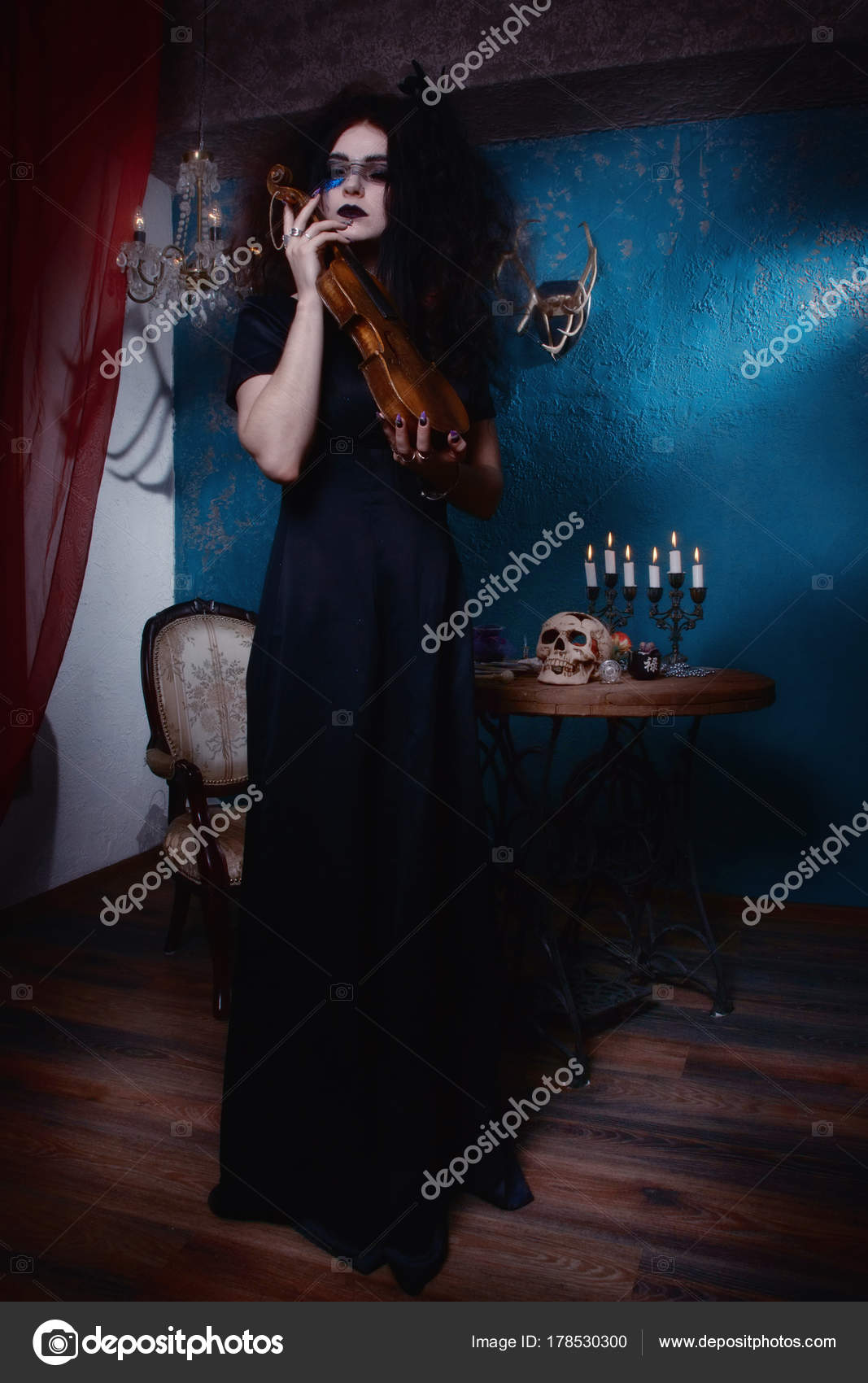 Evil witch plays the violin without strings Stock Photo by ©Demian ...