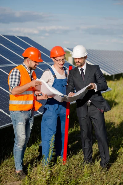 Client signing agreement at solar energy station. Stock Photo by ...
