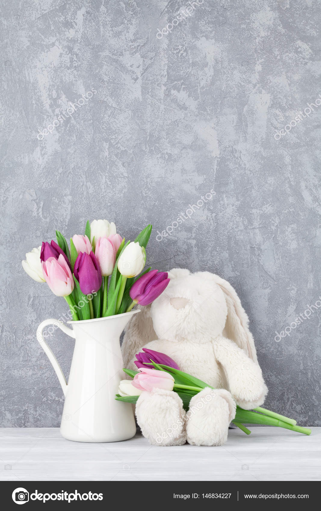 Colorful tulips and rabbit Stock Photo by ©karandaev 146834227