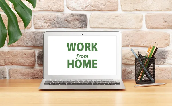 Stylish home studio workspace with laptop computer and supplies. Work ...