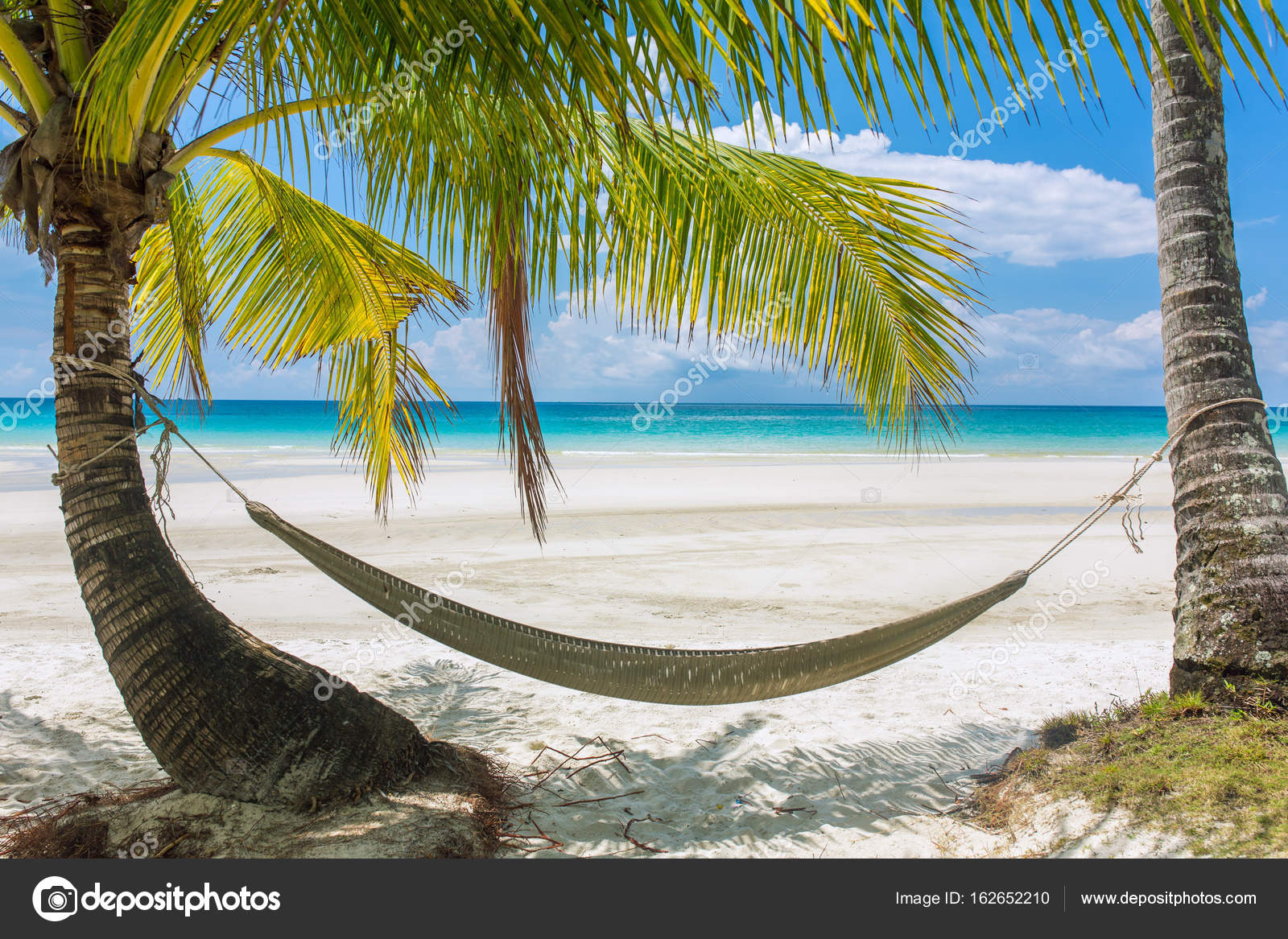 Hammock between palm trees on beach Stock Photo by ©mazzzur 162652210 Hammock between palm trees on beach Stock Photo by ©mazzzur 162652210