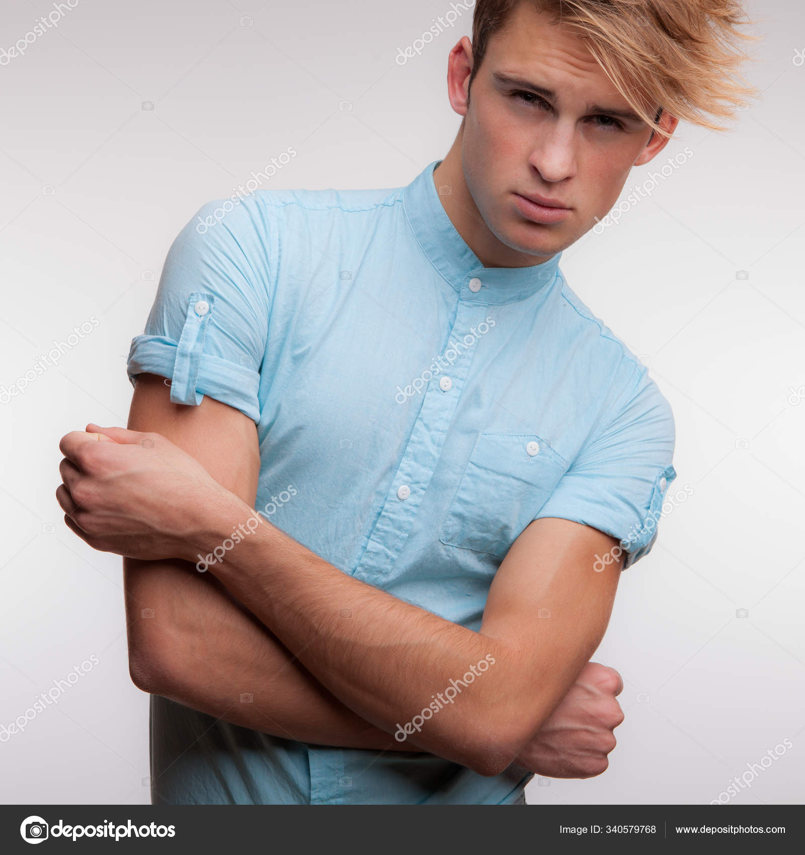 Handsome young elegant man studio portrait. Stock Photo by ©innervision ...