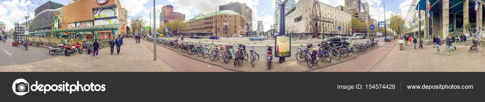 ROTTERDAM, THE NETHERLANDS - APRIL 2015: Tourists visit city str ...