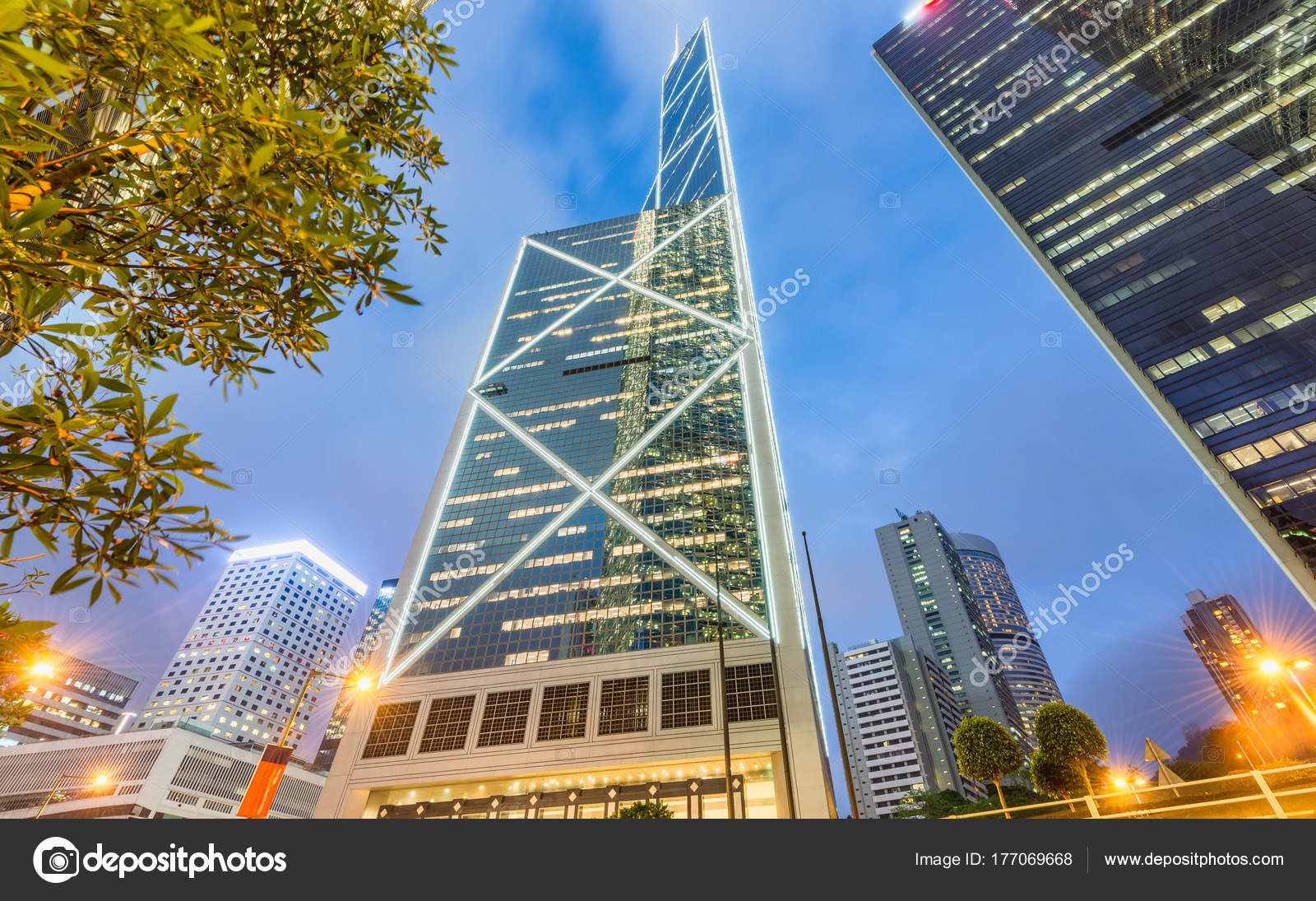 Central skyscrapers with road car light trails at night, Hong Ko ...