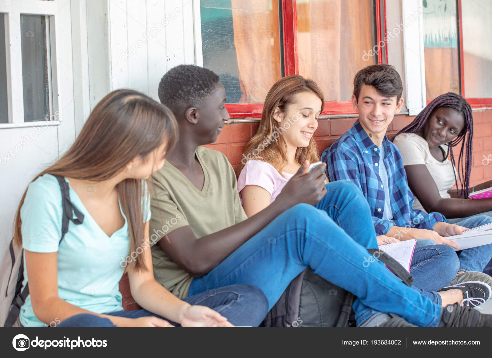 Group Of Teenagers Talking