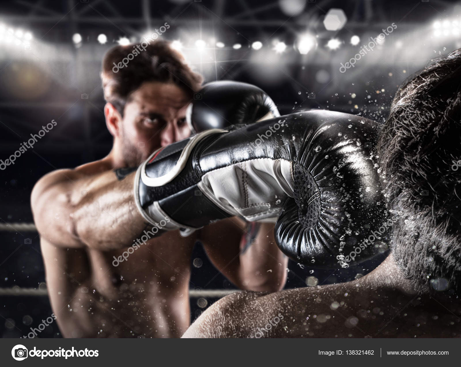 Boxer in a boxe competition beats his opponent — Stock Photo ...