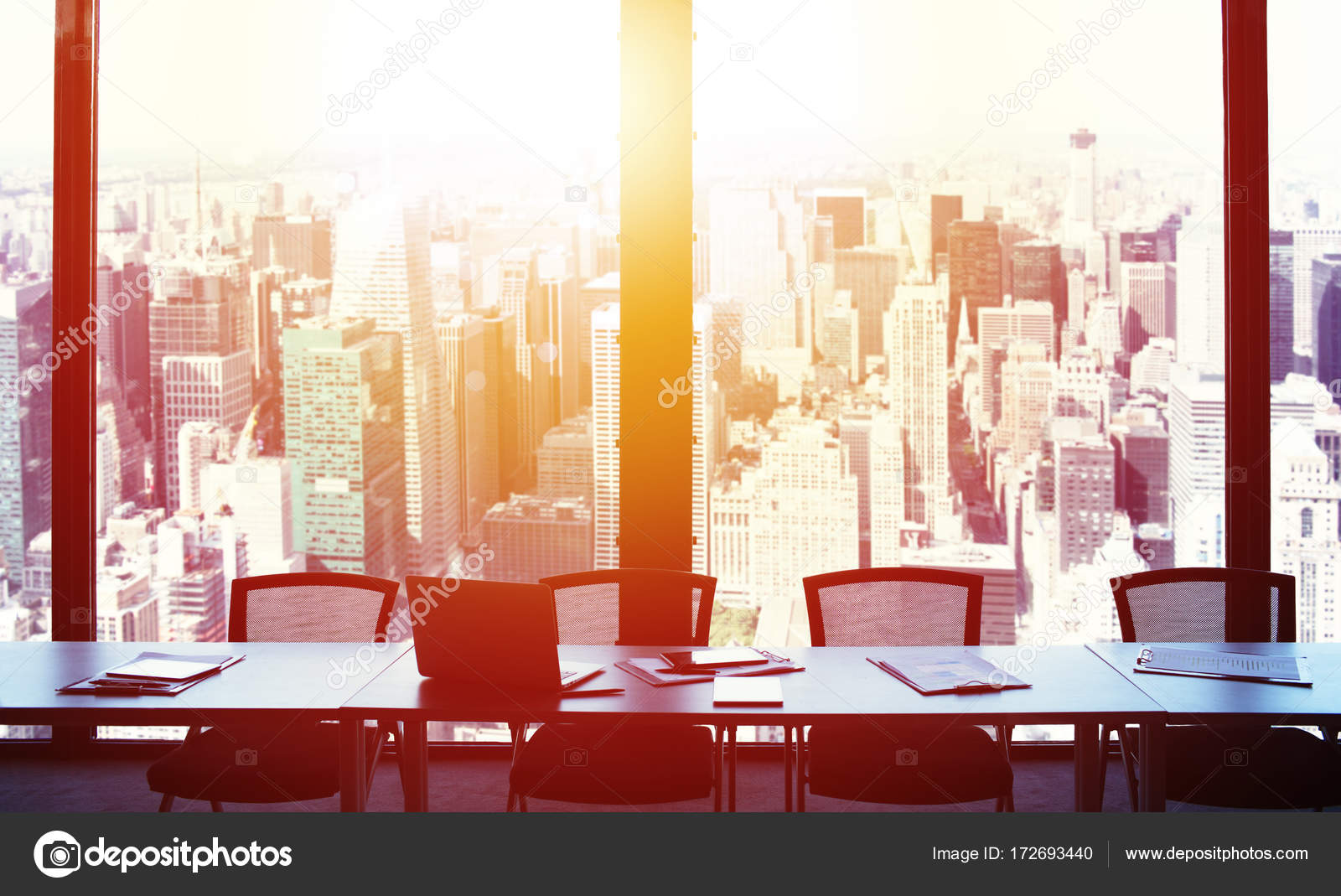 Office in a skyscraper with city view Stock Photo by ©alphaspirit 172693440