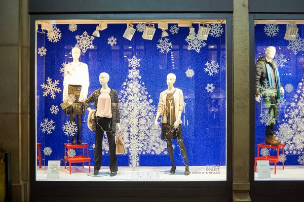 christmas decorated shop window at night - Stock Image - Everypixel