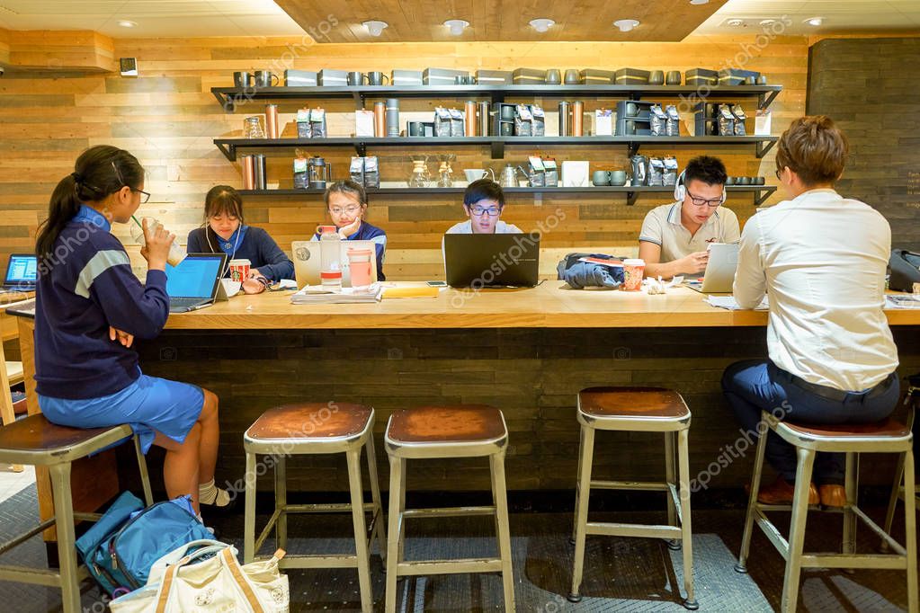 Students with laptops in Starbucks – Stock Editorial Photo © teamtime ...