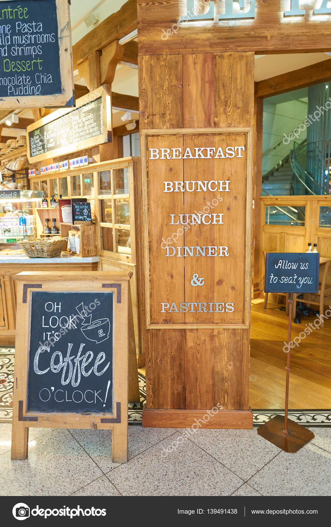 Restaurant sign at Dubai Airport – Stock Editorial Photo © teamtime ...