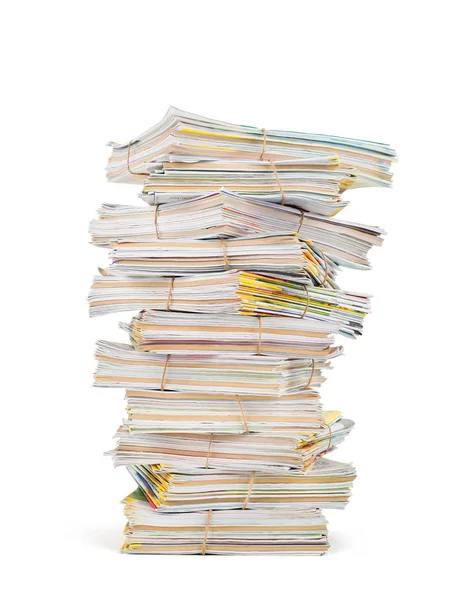 A stack of leaves and an open suitcase isolated on a white background ...