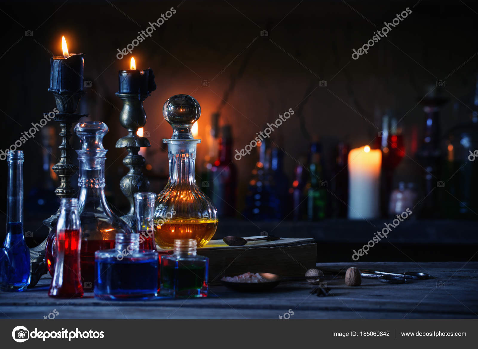 Magic potion, ancient books and candles — Stock Photo © Kruchenkova ...