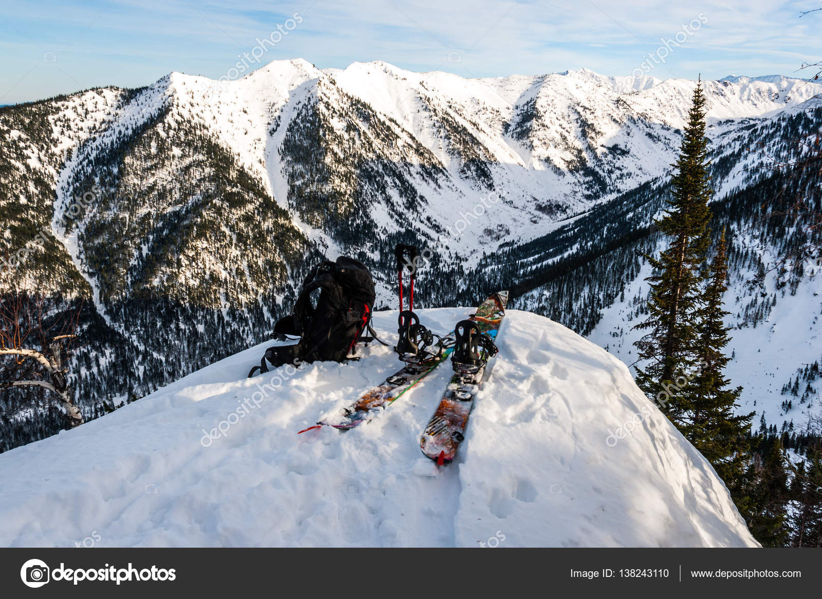 Splitboard, backpack and ski poles on the mountain background Stock ...