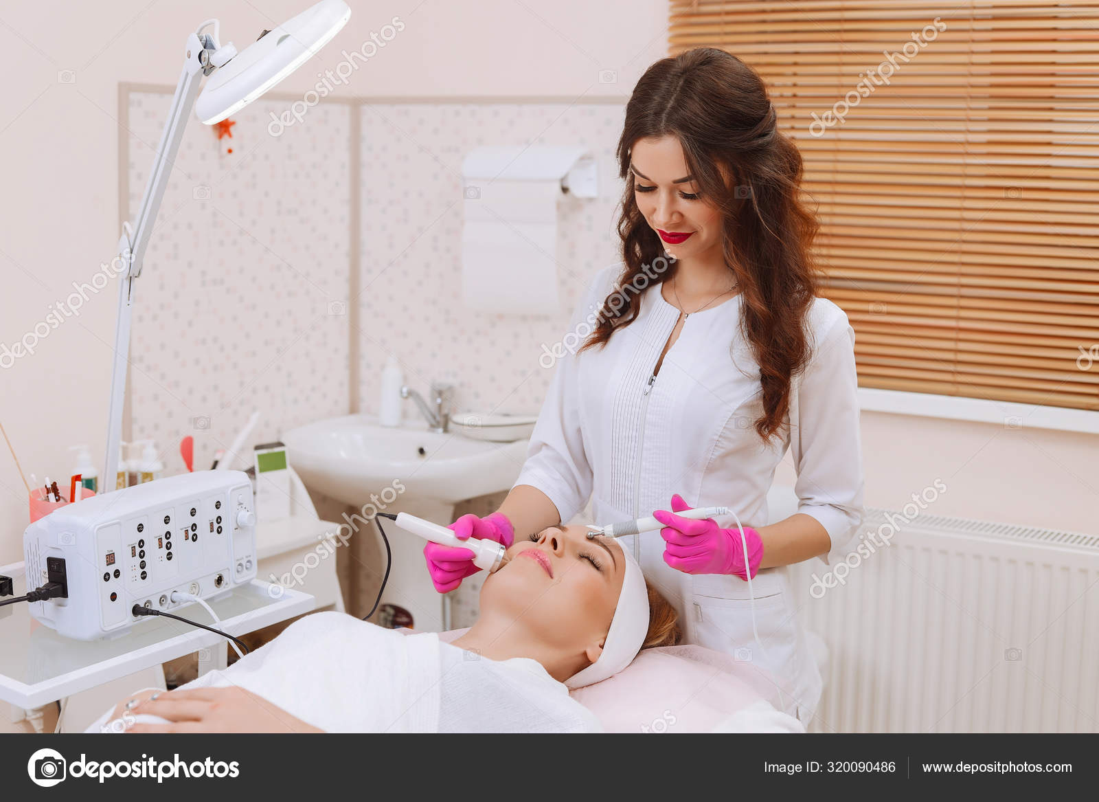 Ultrasound cavitation procedure. Anti-aging, lifting procedure. Stock ...