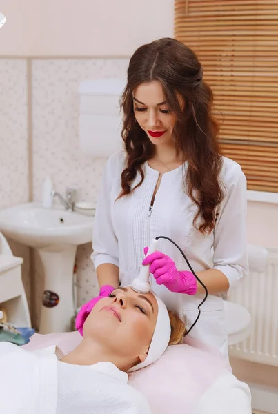 Ultrasound cavitation procedure. Anti-aging, lifting procedure. - Stock ...