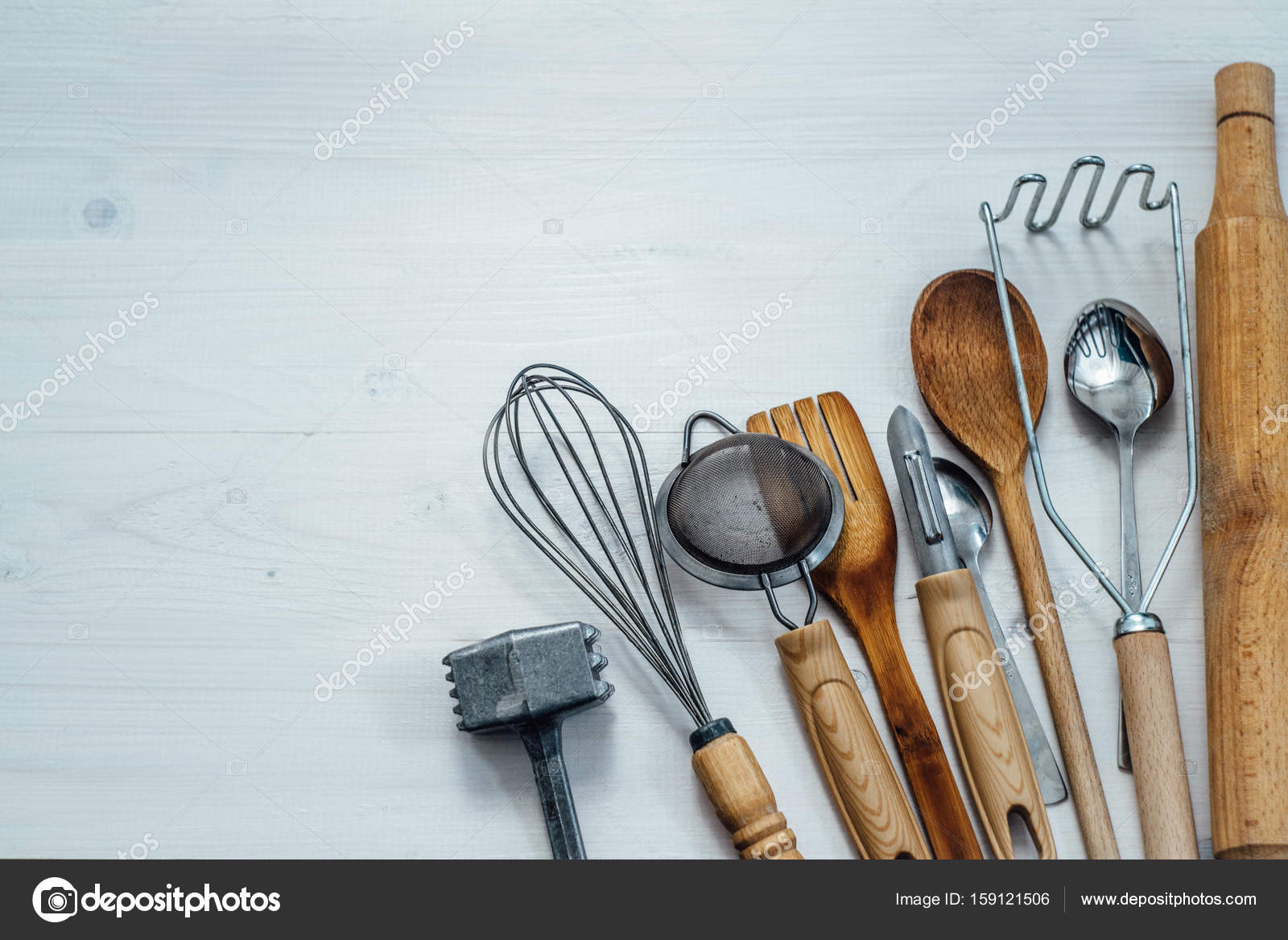 Kitchen utensils in container Stock Photo by ©iryna_budko 159121506