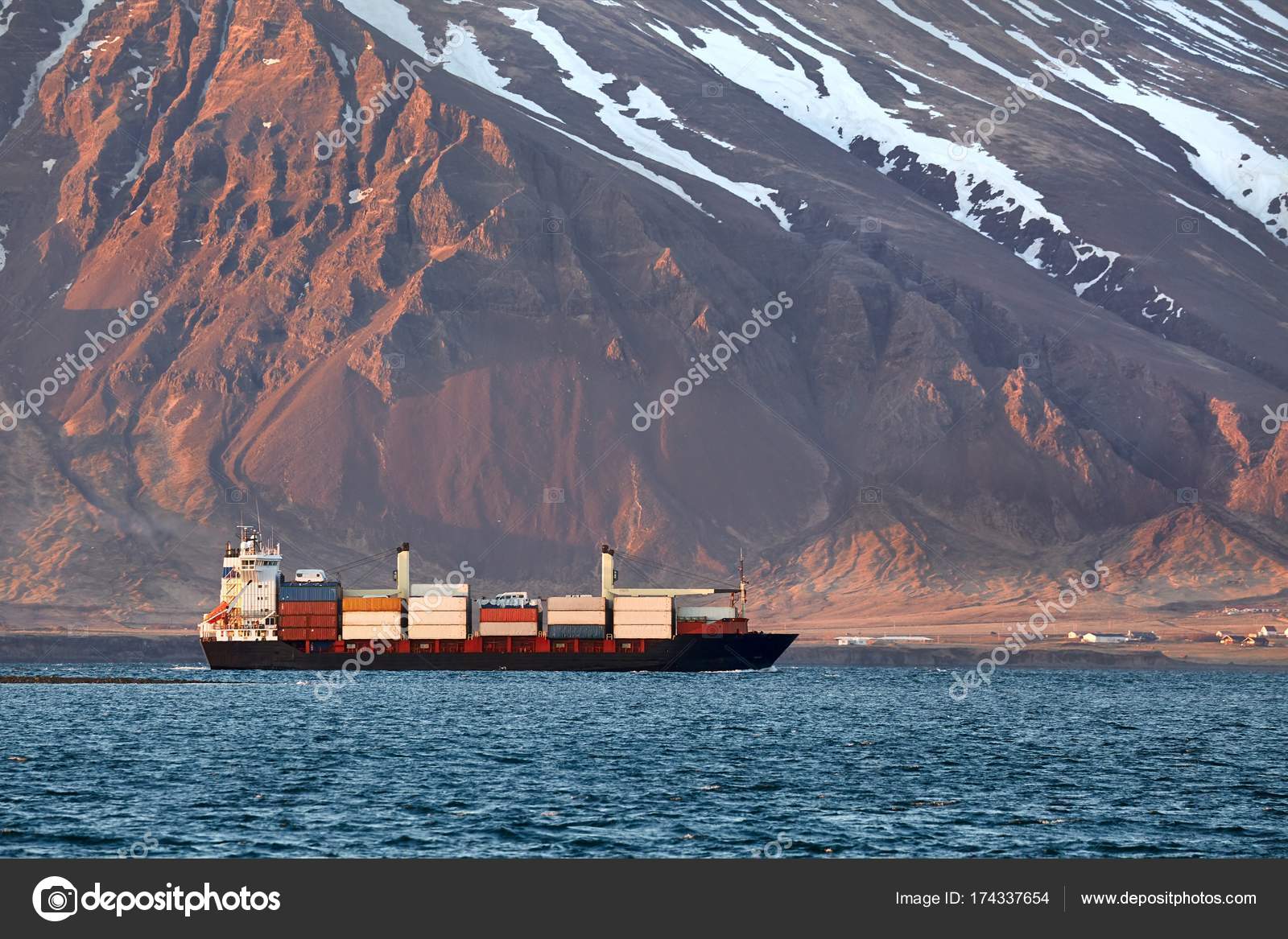 Container ship in Iceland — Stock Photo © Gudella #174337654
