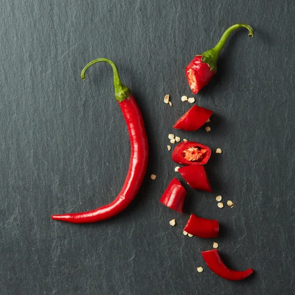 Red chilli cut into slices Stock Photo by ©artjazz 127382840