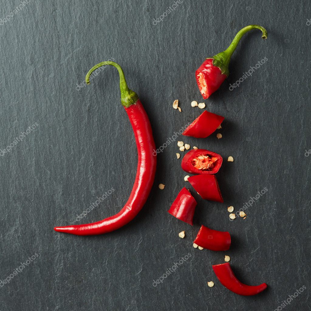 Chopped red chilli pepper Stock Photo by ©artjazz 127964916