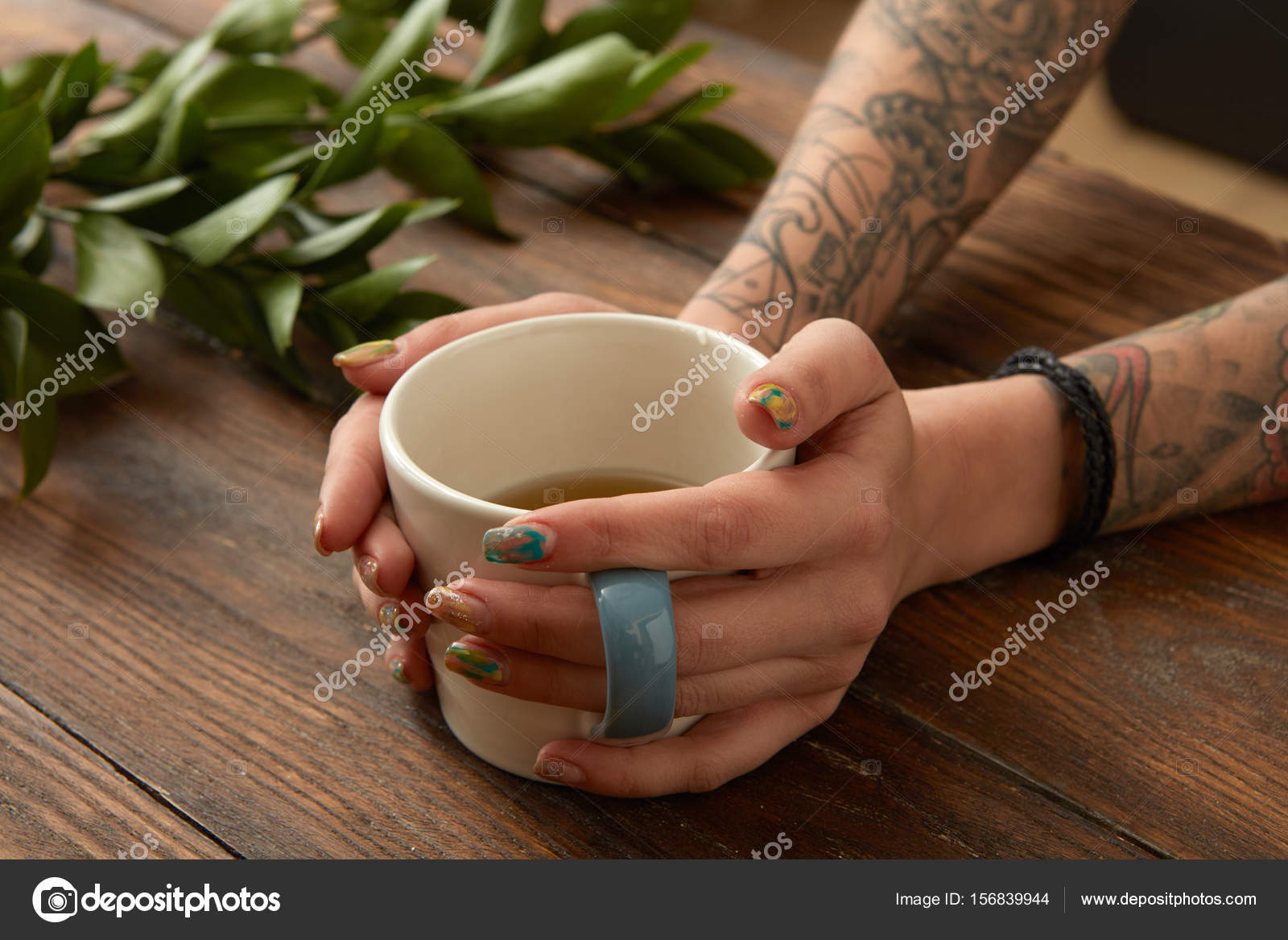 Cupped Hands Tattoo
