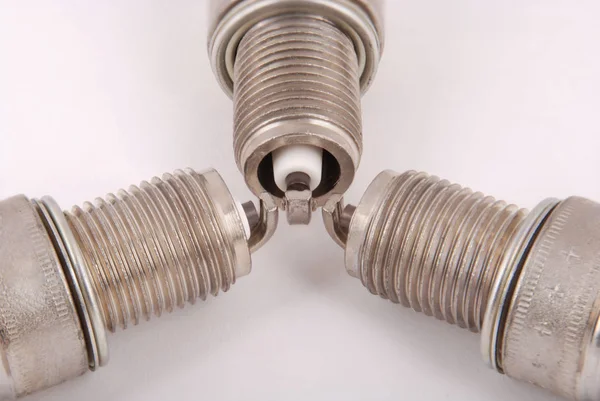 Four new spark plugs — Stock Photo © akova777 #140653518