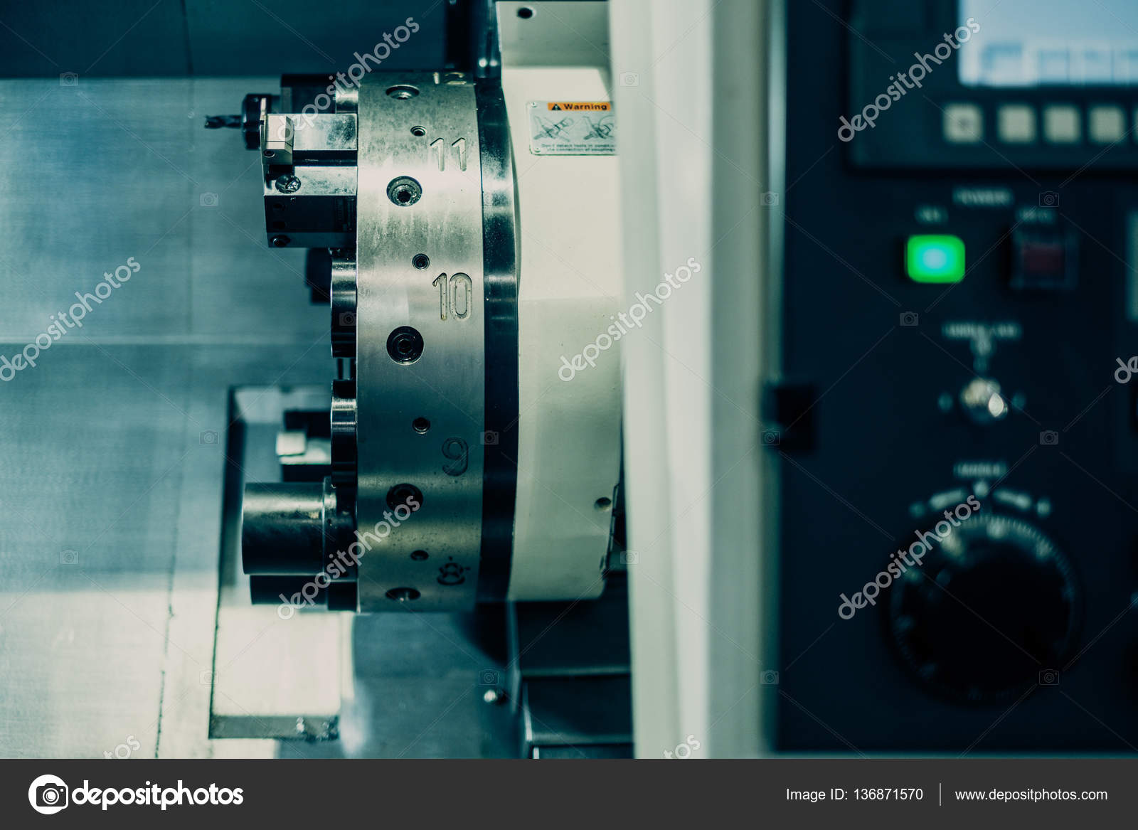 Horizontal turning lathe machine Stock Photo by ©nejron 136871570