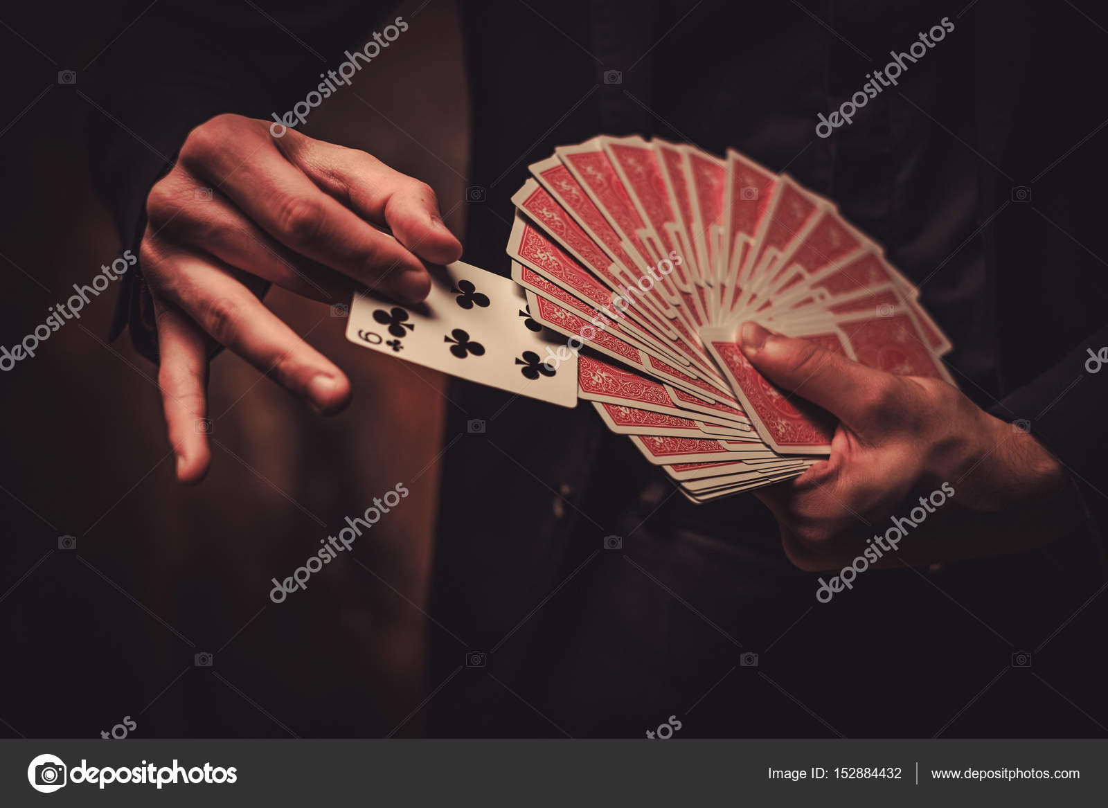 Man showing tricks with cards — Stock Photo © nejron #152884432