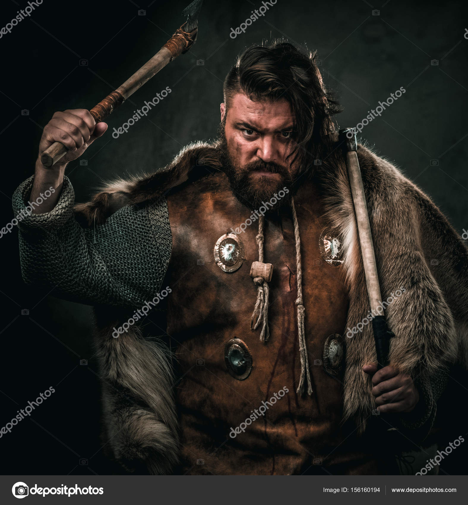 Viking with cold weapon in a traditional warrior clothes — Stock Photo ...