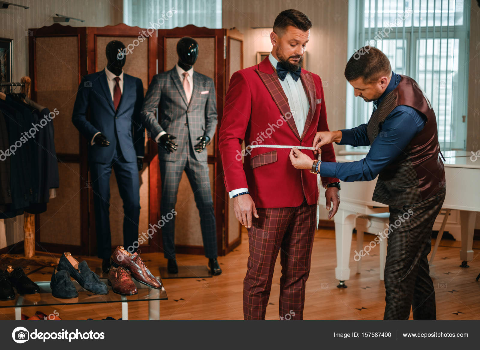 Tailor measuring client for custom made suit tailoring. — Stock Photo ...